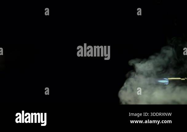 Blue Blowtorch Flame Jet in Smoke Stock Video Footage - Alamy