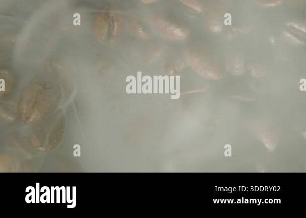 Roasted Coffee Beans With Swirling White Smoke on Black Background Copy ...