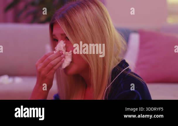 Unhappy stressful young woman starts crying from dramatic film movie ...