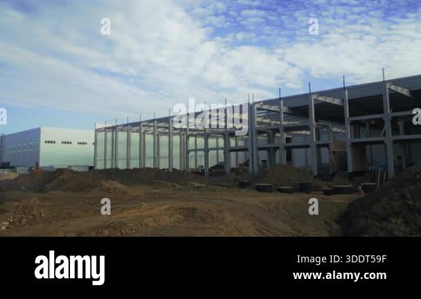 This video showcases the dynamic construction of a large building in a ...