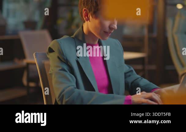 Smiles woman with pink hair use laptop with LGBT stickers feel happy in ...