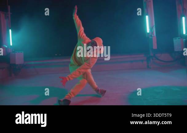 Talented street performer dancing breakdance moves choreography ...