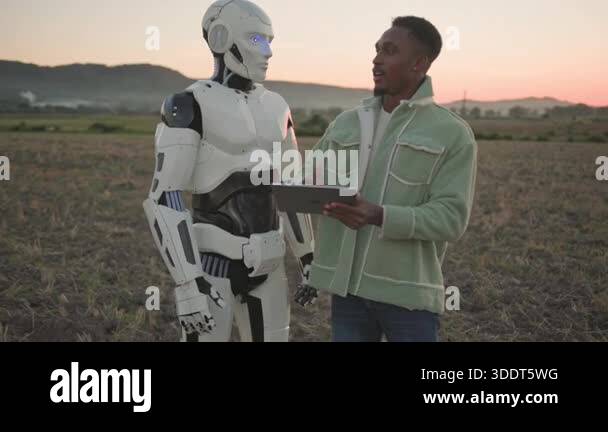 A human being engages in interactive communication with a highly ...