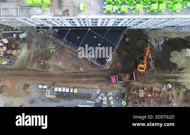Aerial drone view industrial production area with unfinished buildings ...
