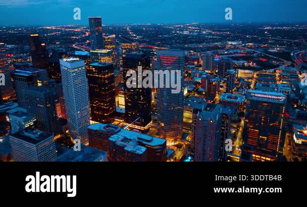 Nightlife of modern Houston, Texas, USA. Drone footage rising over the ...