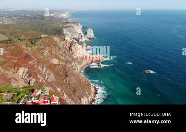 Aerial Survey Of Dramatic Eroding Cliffs And Deep Blue Ocean, Coastal ...