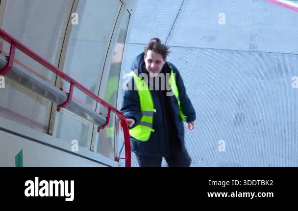 Caucasian Woman Climbing Airport Stairs Wearing Reflective Safety Vest ...
