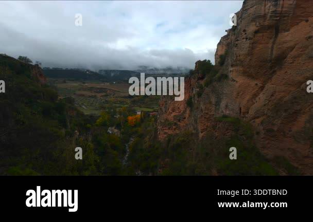 Red Cliff Overlooking Patchwork Valley Fields With Terraces And ...