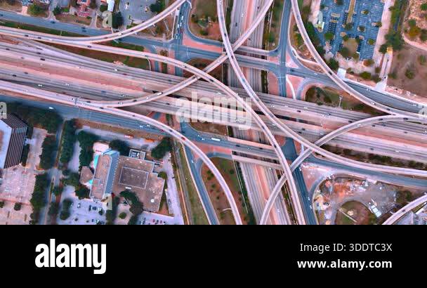 Transport moves non-stop by the intertwining highways and trestles in ...