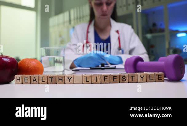 Doctor prescribes balanced diet and regular workouts. Wooden blocks ...