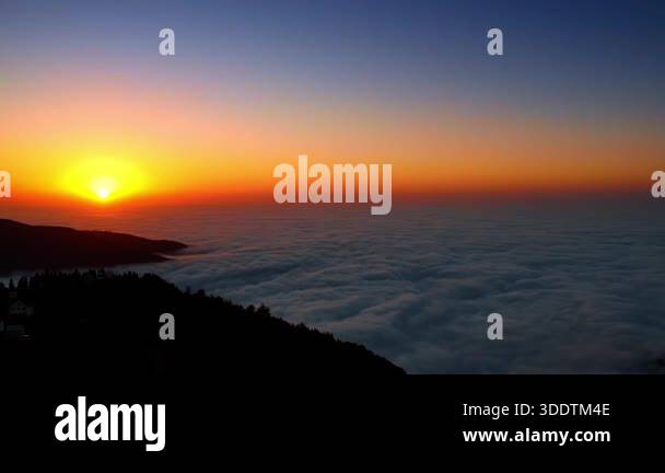 Flight over the mountain village in the dark pine tree forest. Setting ...
