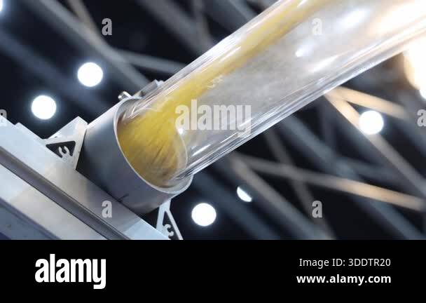Plastic pellets air tubes. Close up of transparent industrial tube ...