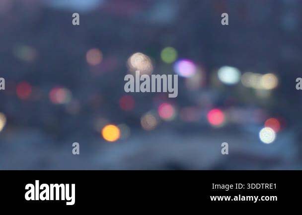 Abstract view of blurred red and blue tail lights from moving traffic ...