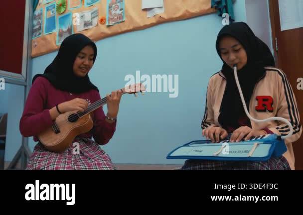 Red curtains open to reveal a performer in a ringmaster-style red ...