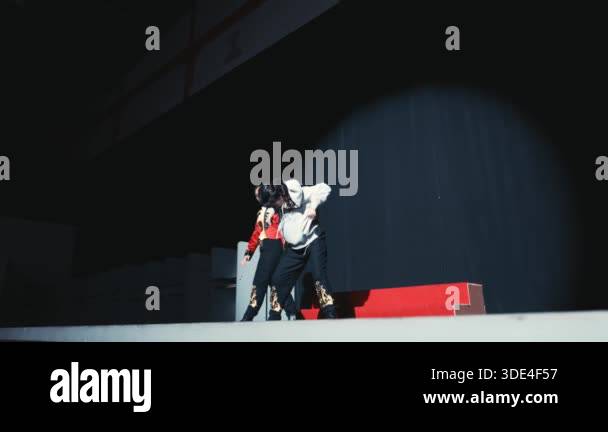 Close-up, low angle shot of two women performing synchronized ...