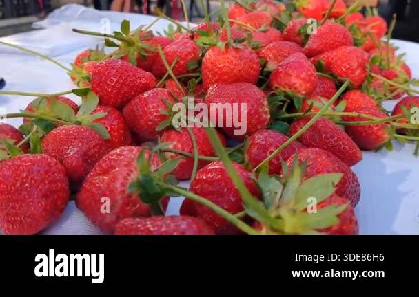 Fresh strawberries fruit for sale at local market in summer. Healthy ...