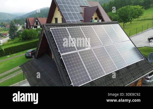Solar energy panels on roof and grass Stock Video Footage - Alamy