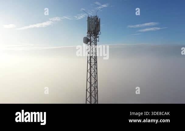 Foggy view of a tall mobile phone mast Stock Video Footage - Alamy