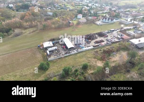 Rusty metal recycling yard in rural landscape Stock Video Footage - Alamy