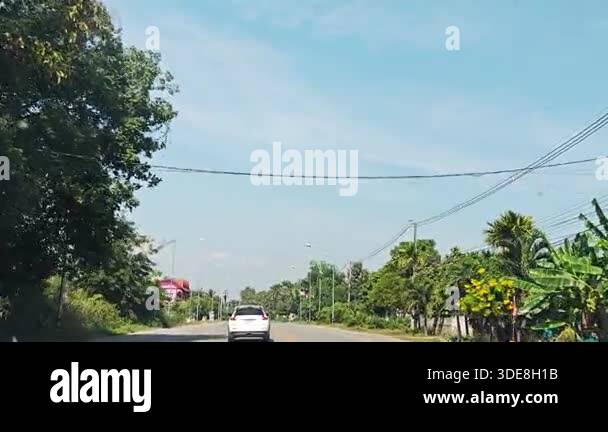 Roadside view with electric poles along the road Stock Video Footage ...