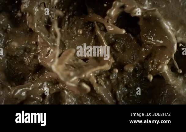 Super Slow Motion Shot of Splashing Mud Background at 1000fps. Filmed ...
