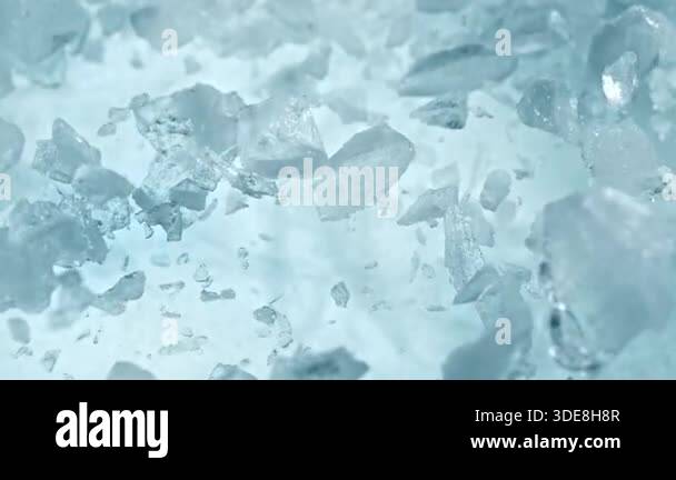 Super Slow Motion Shot of Real Ice Pieces Exploding Towards Camera on ...