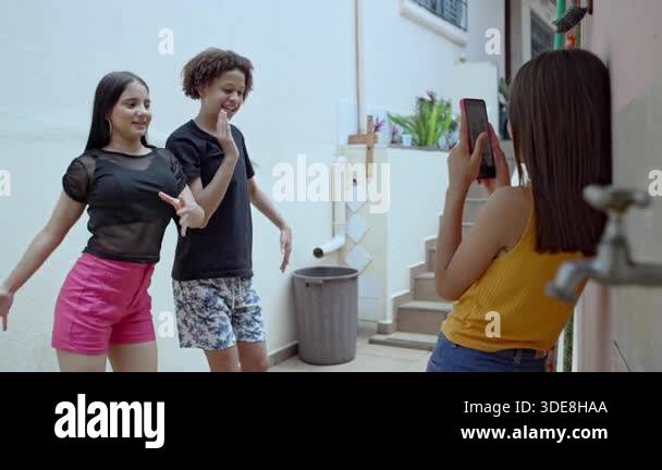 Teens Performing Dance Moves While Being Recorded On Phone By Friend ...