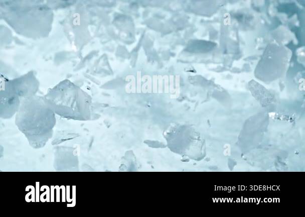 Super Slow Motion Shot of Real Ice Pieces Exploding Towards Camera on ...