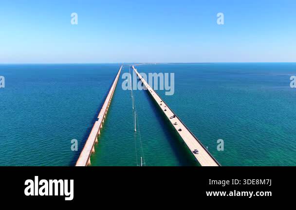 Aerial pull out shot Florida Keys Seven Mile Bridge and Heritage trail ...