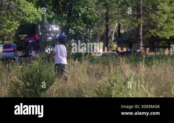 little boy in camping in Yosemite National Park Stock Video Footage - Alamy