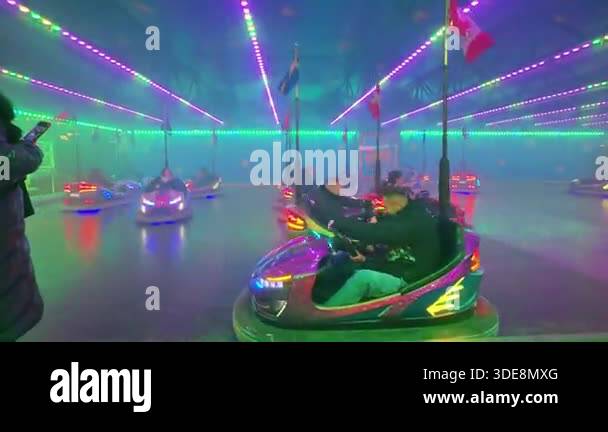 BUDAPEST, HUNGARY NOVEMBER 28, 2025: Electric bumper cars driving at a ...