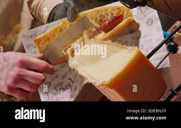 Traditional cheese raclette. Food culture in France. A warm and ...