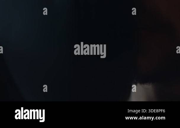 Cropped view of a handsome male rap singers face with professional ...