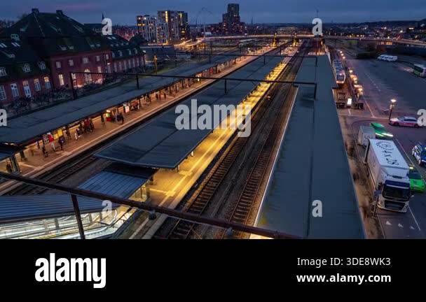 Time lapse clip of trains arriving and departing the train station in ...