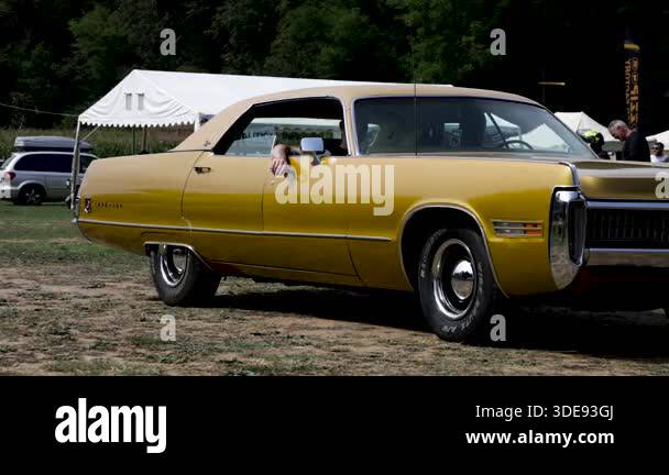 Classic American Muscle Cars Arriving at Auto Show in Slow Motion Stock ...