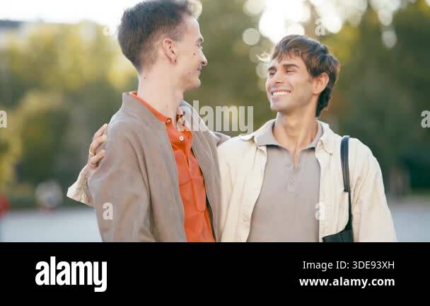 Young affectionate male couple sharing a tender moment. Happy partners ...