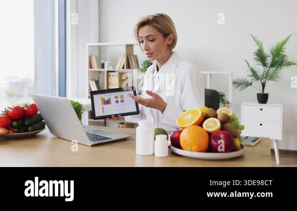 Dietitian explaining nutrition plan client Stock Videos & Footage - HD ...