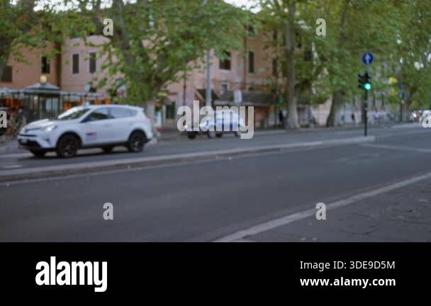 Rome street scene with defocused bokeh and soft evening blur outdoor ...