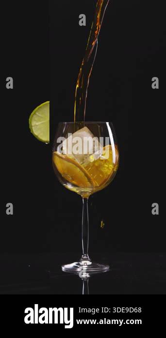 Ad template. Split cocktail and soda drink with lime on black ...
