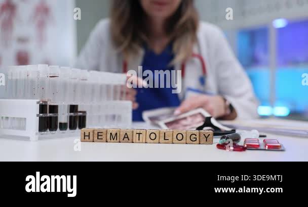 Word Hematology on wooden cubes with blood samples in tubes and ...