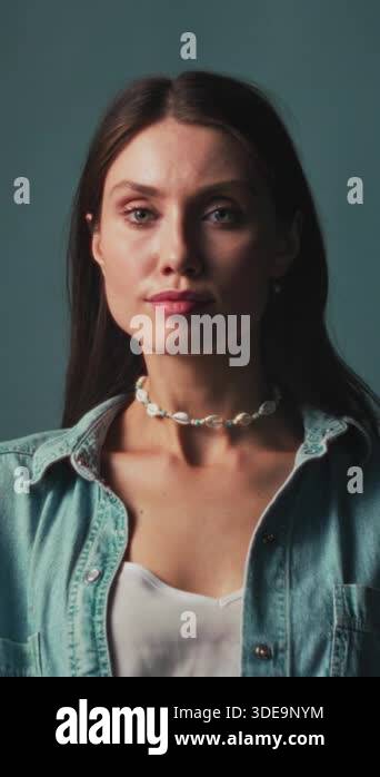 Caucasian woman eyes closed reflective pose, soft studio light and ...
