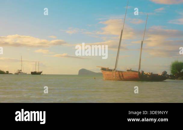 This captivating video features a large boat with a distinct letter A ...