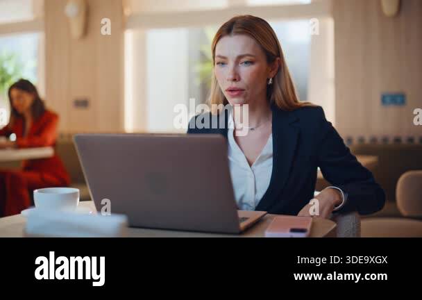 Disappointed freelancer closing laptop sitting modern cafeteria closeup ...