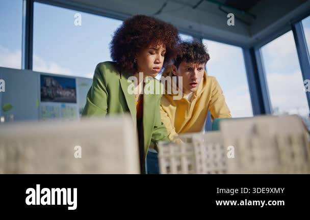 Frustrated designers reading laptop email worried architectural project ...