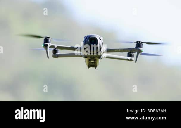 A drone hovers steadily in clear skies over Gold Coast, Australia ...