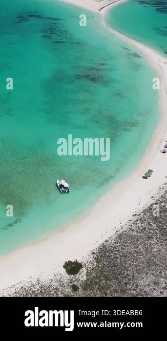 Panning wide landscape of tropical island with turquoise water ...