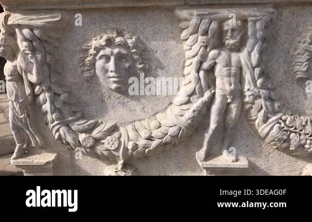 Alexandria, Egypt January 16, 2019: A stone carving of a face in Greek ...