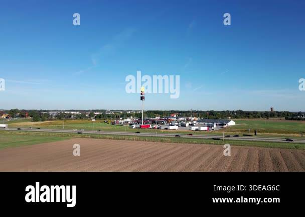 McDonalds roadside restaurant with tall logo sign near highway ...
