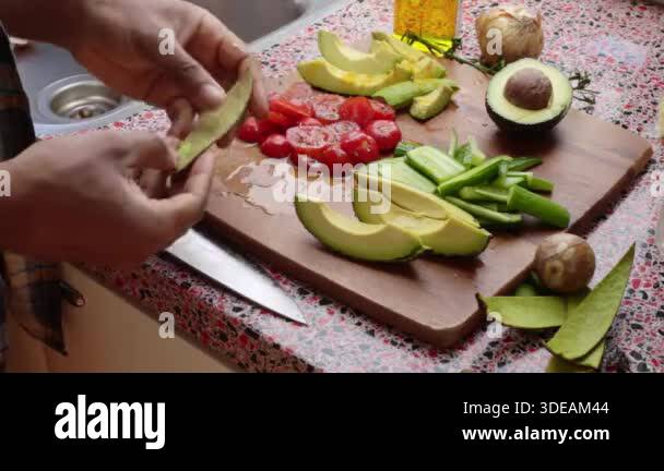 Person hands preparing vegetables on wooden cutting board Stock Video ...