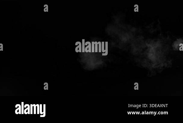 Super slow motion smoke effect of visible breath exhalation in icy ...
